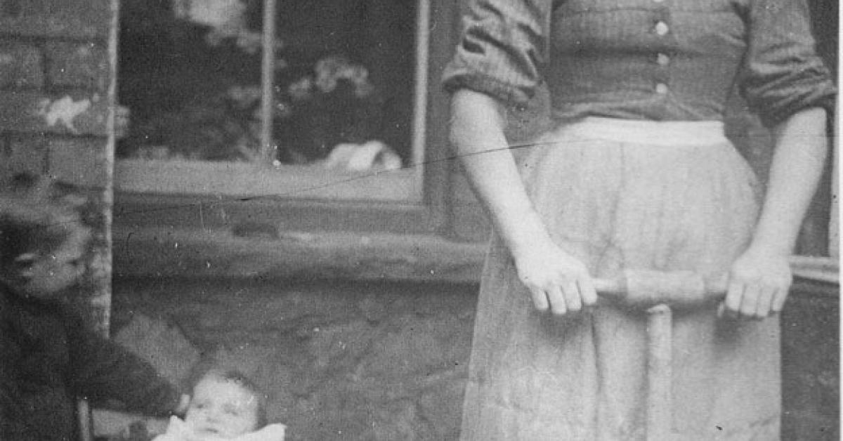 Mrs. George washing with a dolly tub | People's Collection Wales